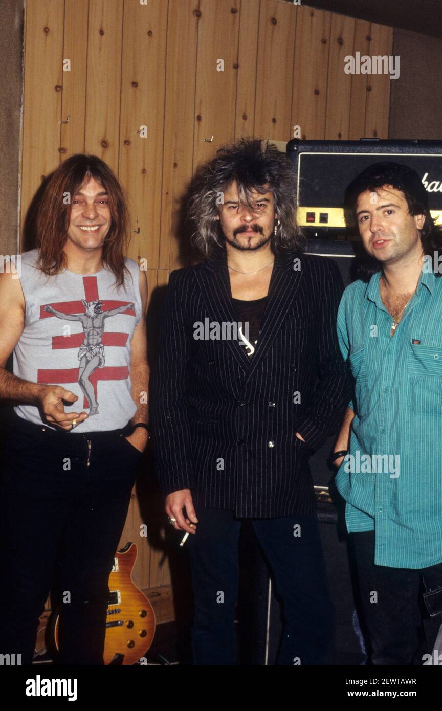 Michael 'Root' Burston, Phil 'Philthy Animal' Taylor and Phil 'Wizzo' Campbell of Motorhead ...