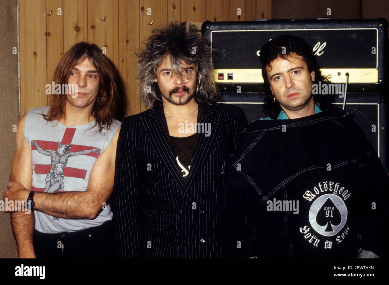 Michael 'Root' Burston, Phil 'Philthy Animal' Taylor and Phil 'Wizzo' Campbell of Motorhead ...