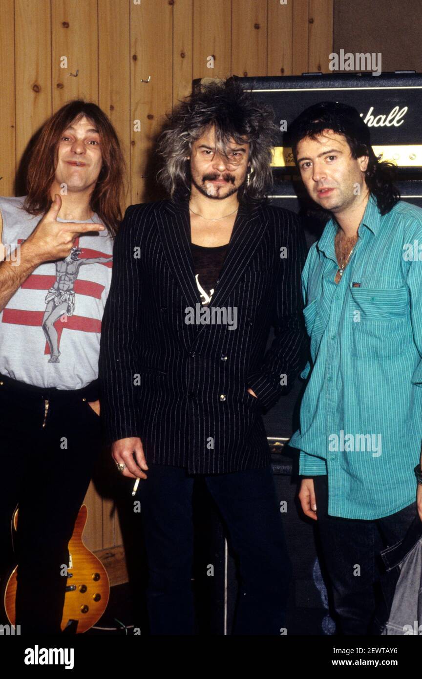 Michael 'Root' Burston, Phil 'Philthy Animal' Taylor and Phil 'Wizzo' Campbell of Motorhead ...