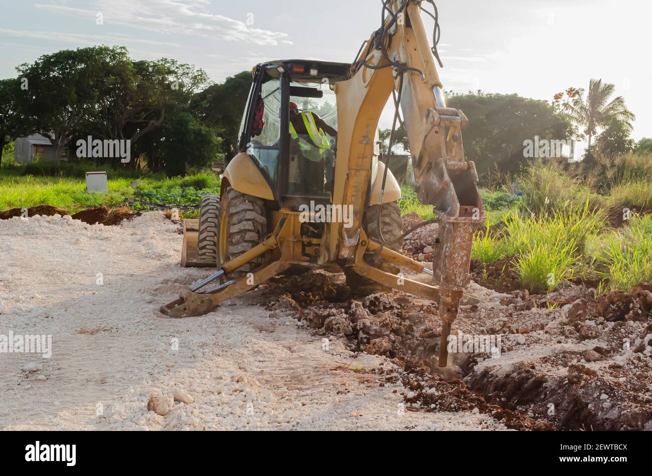 Jackhammer attached hi-res stock photography and images - Alamy