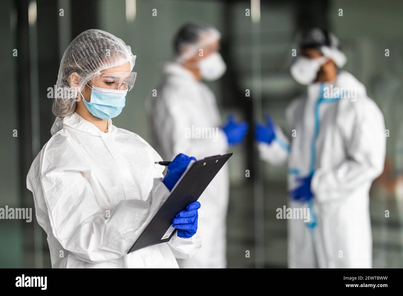 Photo of confident expert virologist doc center clinic holding blank ...