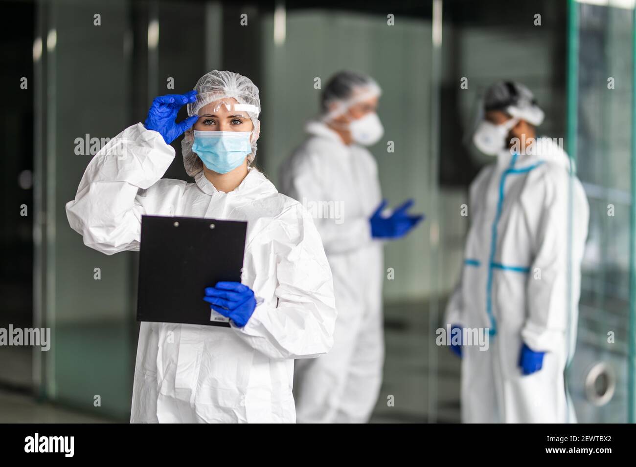 Photo of confident expert virologist doc center clinic holding blank ...