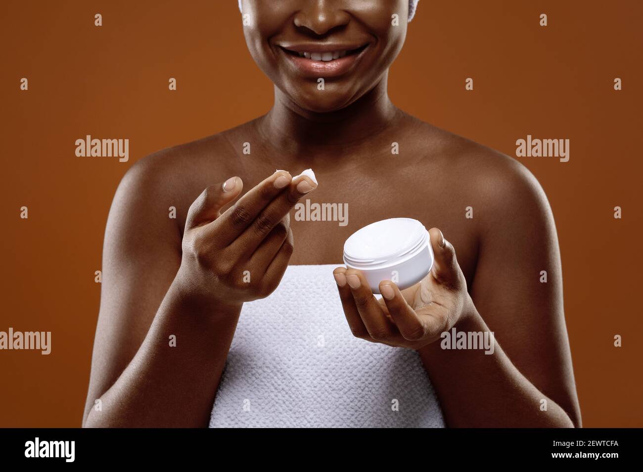 Beauty Care. Young African Lady Holding Open Jar With Body Lotion Stock ...