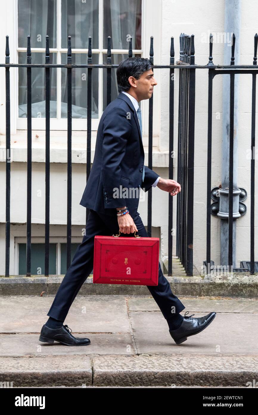 British Chancellor of the Exchequer, Rishi Sunak with the iconic Budget ...