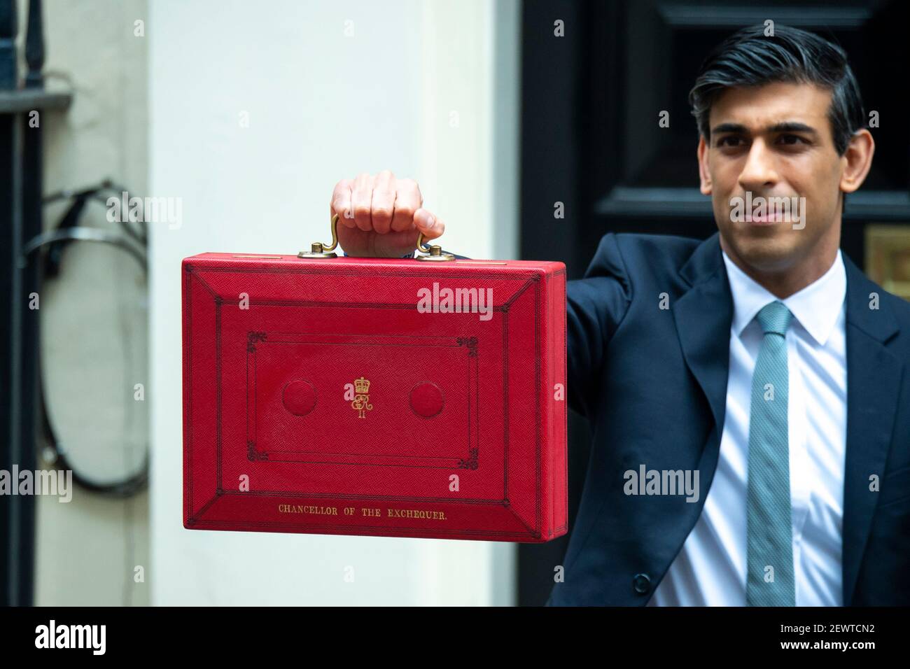 British Chancellor of the Exchequer, Rishi Sunak with the iconic Budget ...