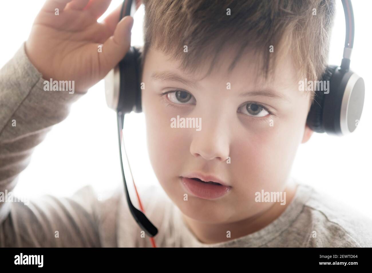 Boy in Headset Stock Photo - Alamy