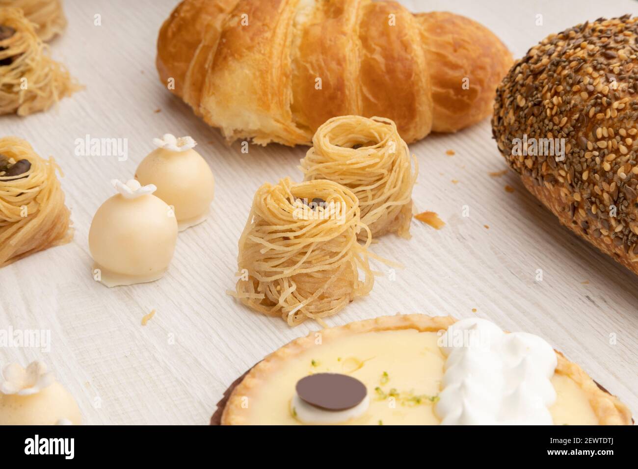 composition of various snacks and desserts among them is a cake ...