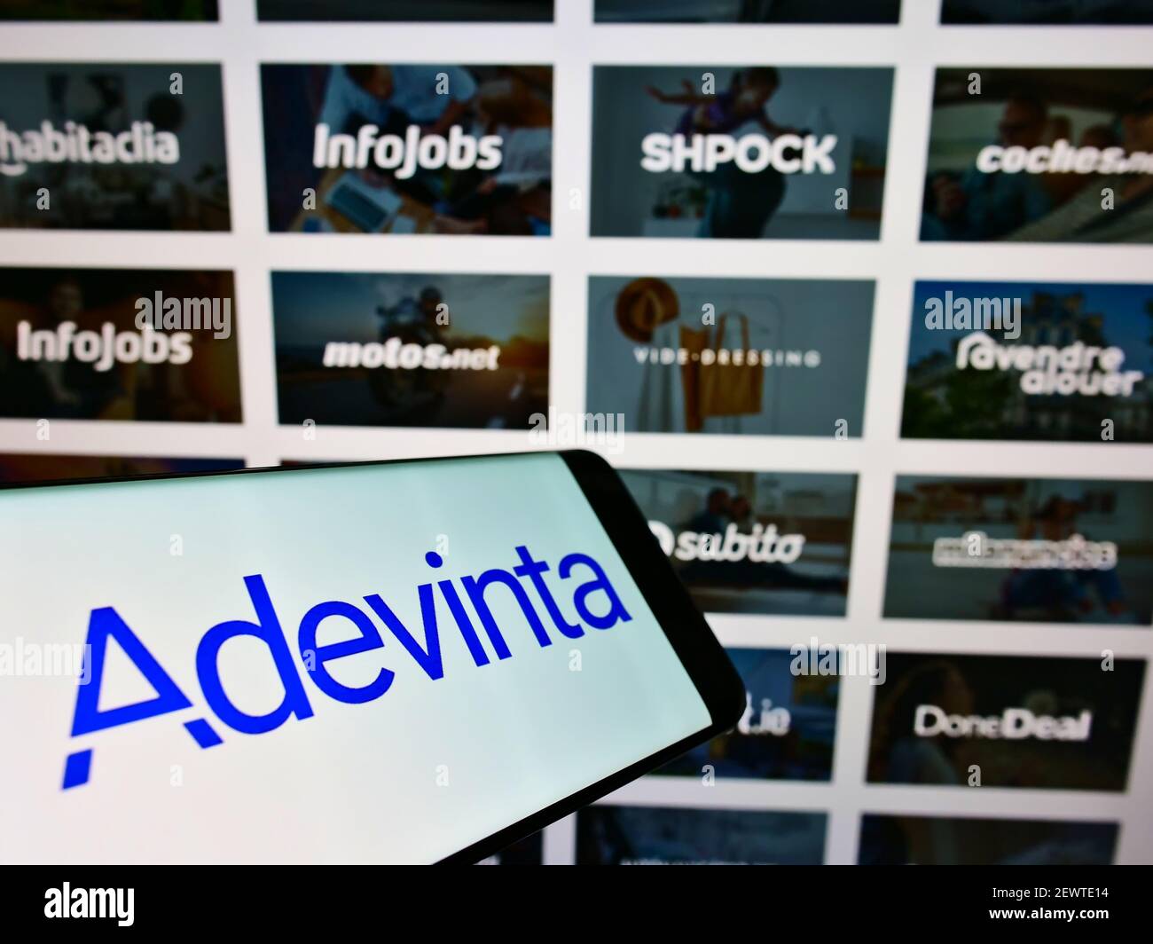Mobile phone with logo of Norwegian e-commerce company Adevinta ASA on ...