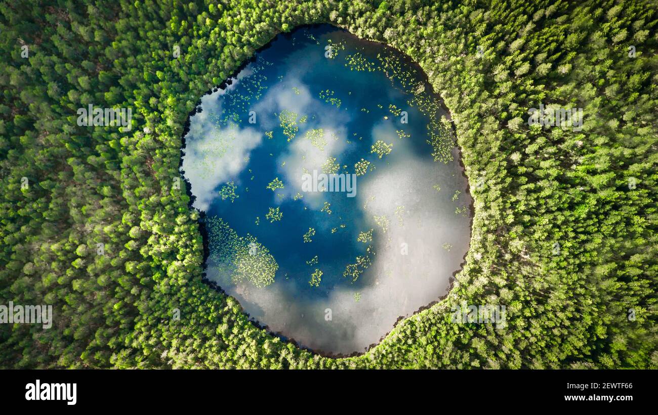 An almost perfect circular lake shot straight down from the air ...
