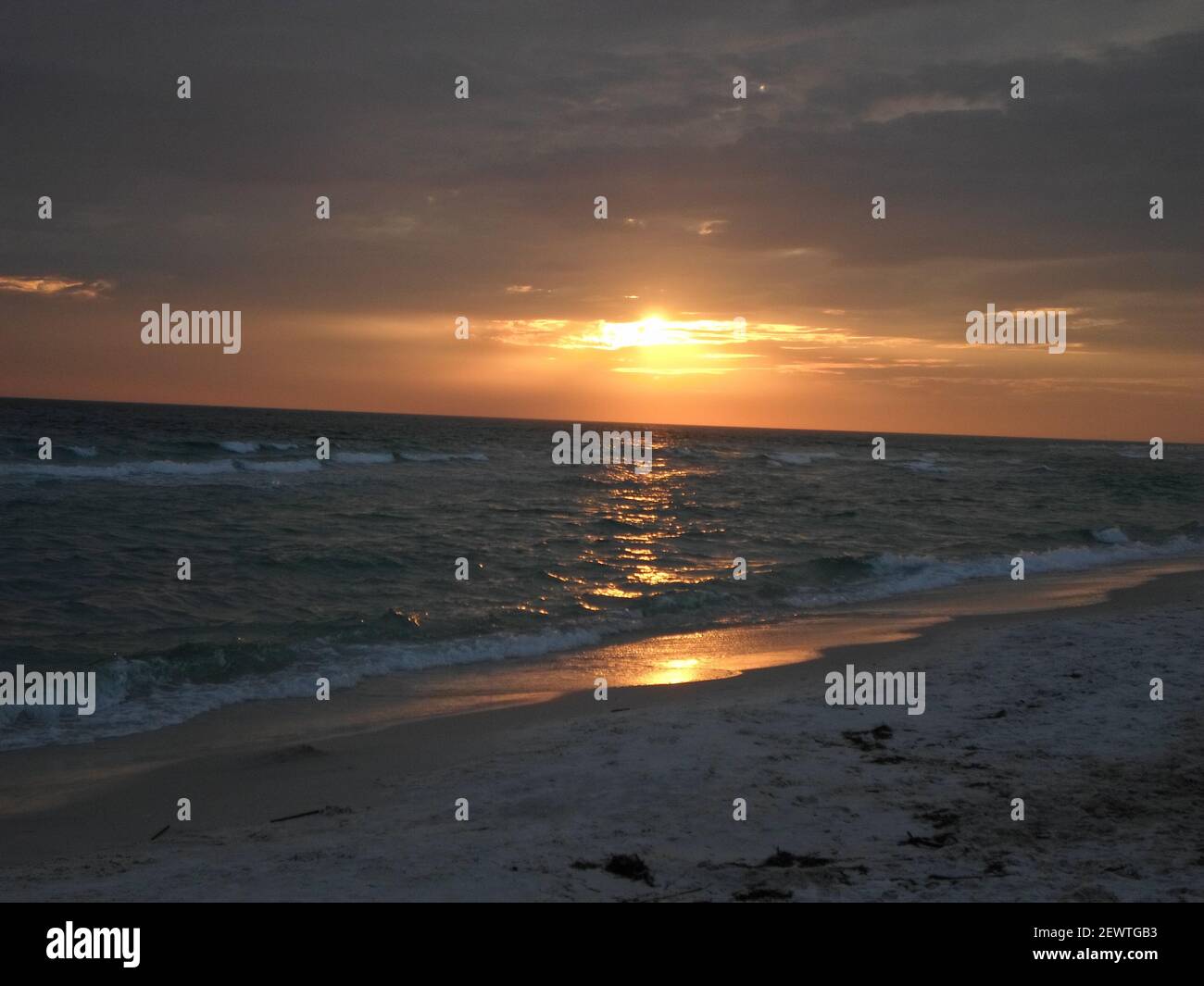 Sunset at the beach Stock Photo - Alamy
