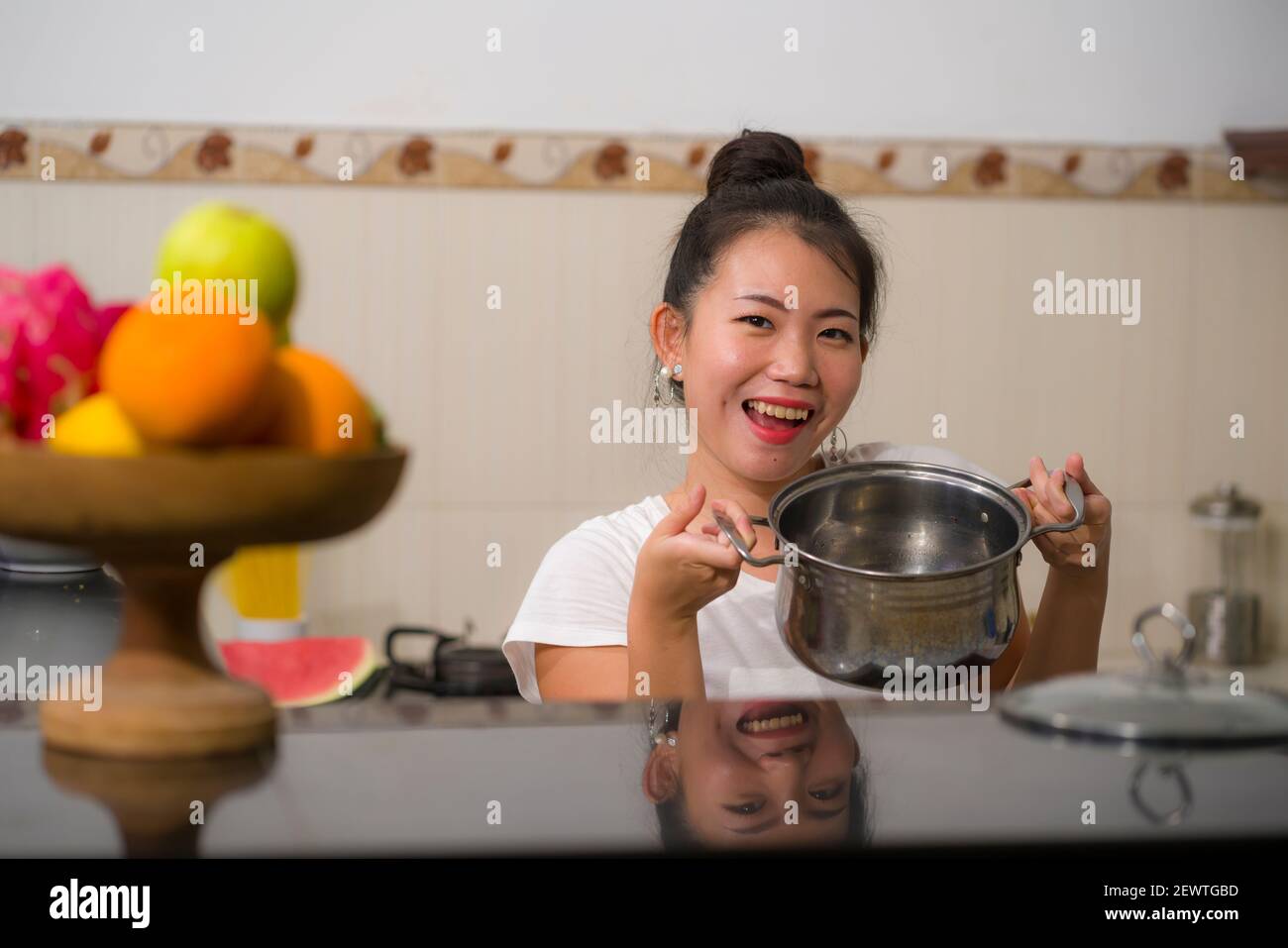 lifestyle portrait of young happy and beautiful Asian Korean woman ...