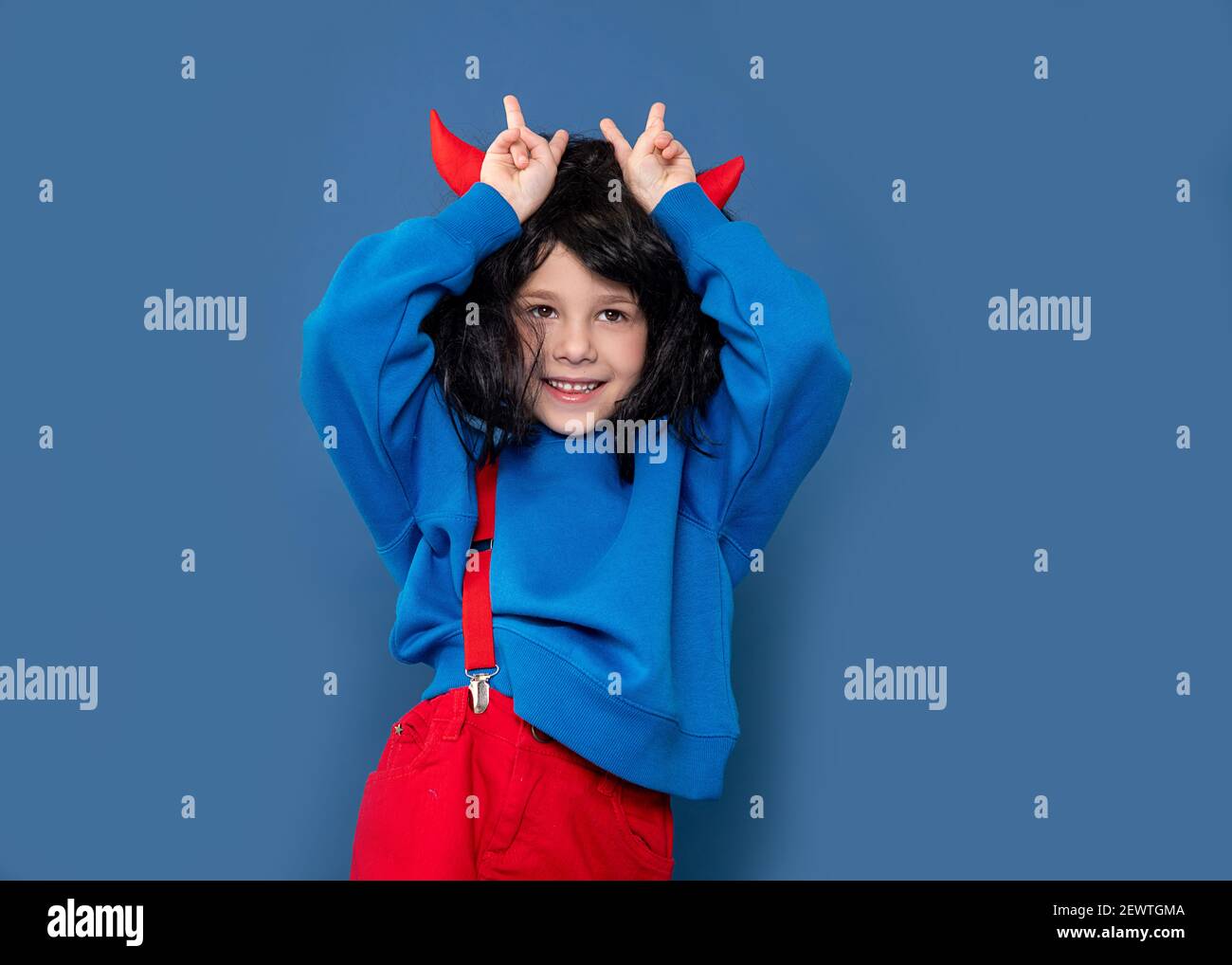 Spoiled child, naughty girl, kids whims. Beautiful little girl in wig ...