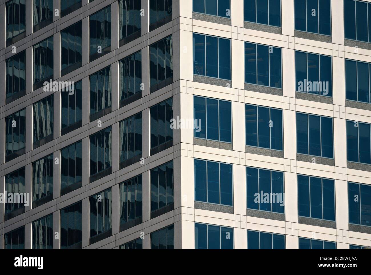 Commercial high-rise building white concrete and glass facade in San ...