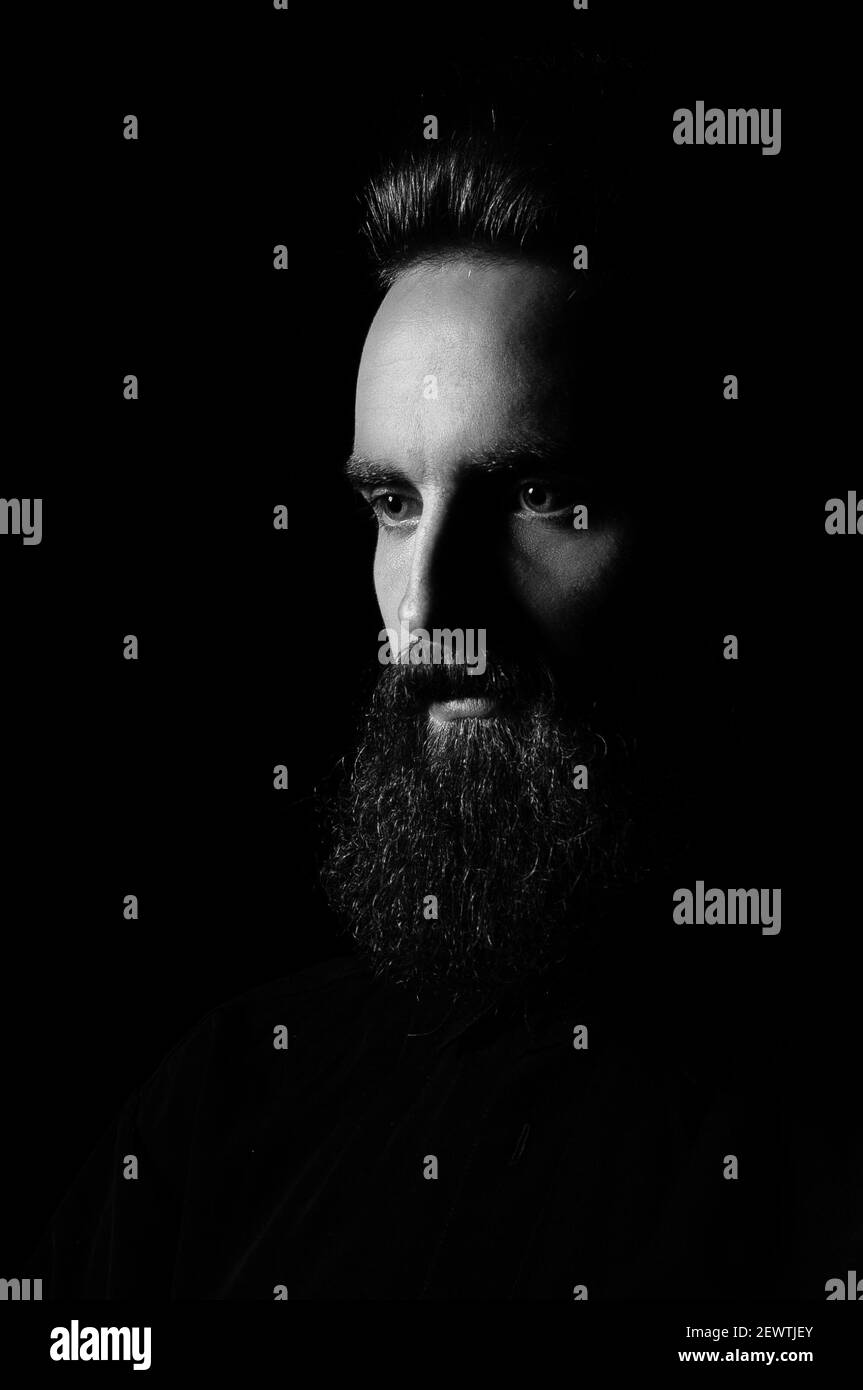 Studio low key profile portrait hi-res stock photography and images - Alamy