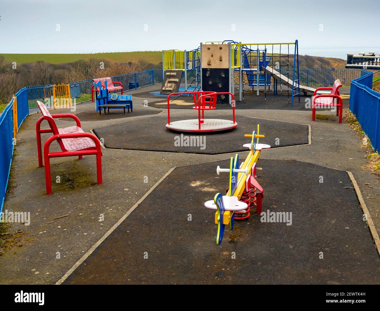 Good play environment, childrens playground with fields and the sea in ...