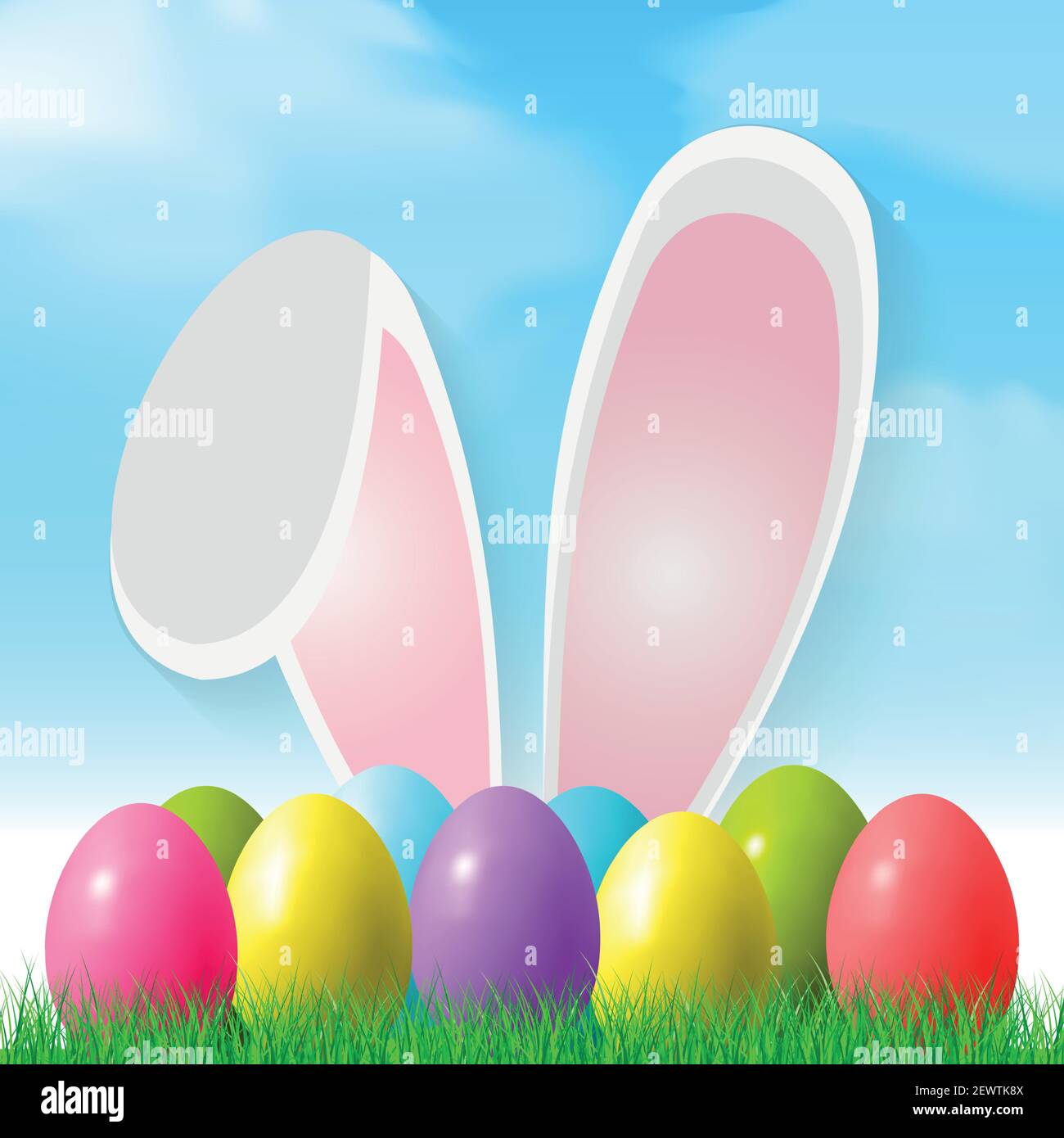 Easter background with colorful eggs lying on the grass, bunny ears ...
