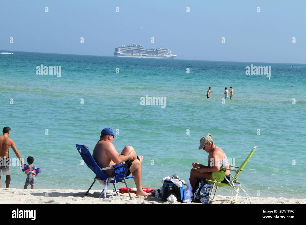 People sunbathing on miami beach hi-res stock photography and images ...