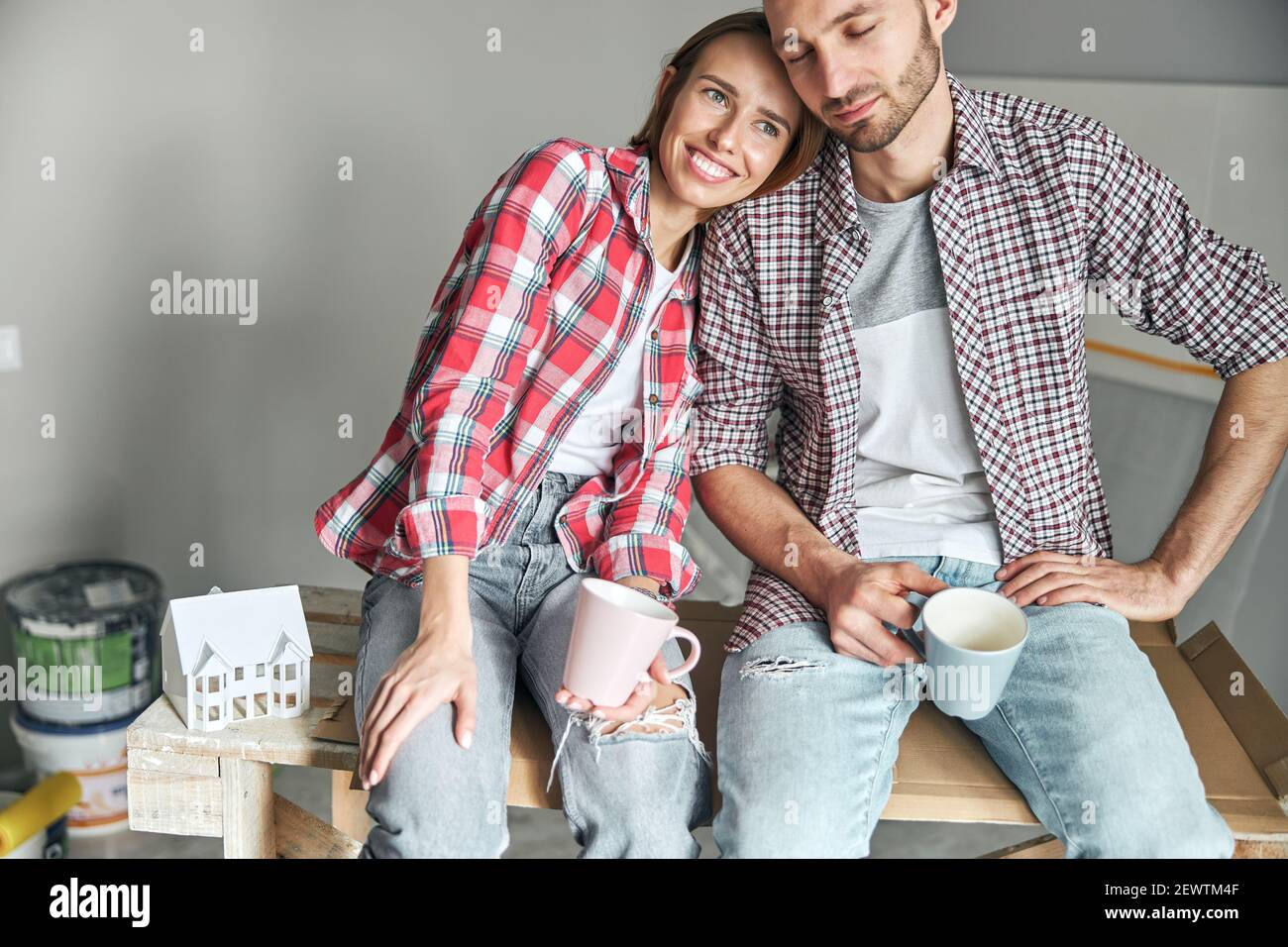 Young couple taking a break from work Stock Photo - Alamy