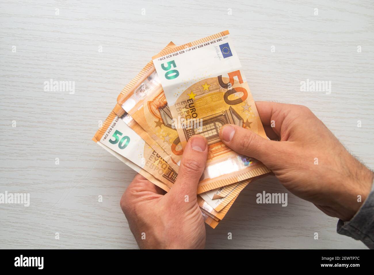 Woman money calculate euro hi-res stock photography and images - Alamy