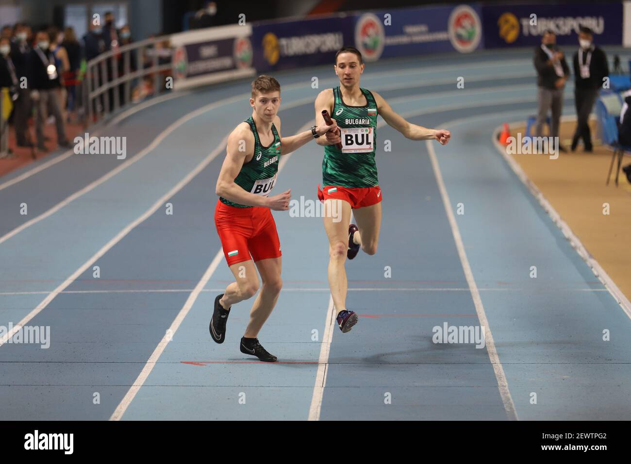 ISTANBUL, TURKEY - FEBRUARY 20, 2021: Athletes running 4x400 metres ...