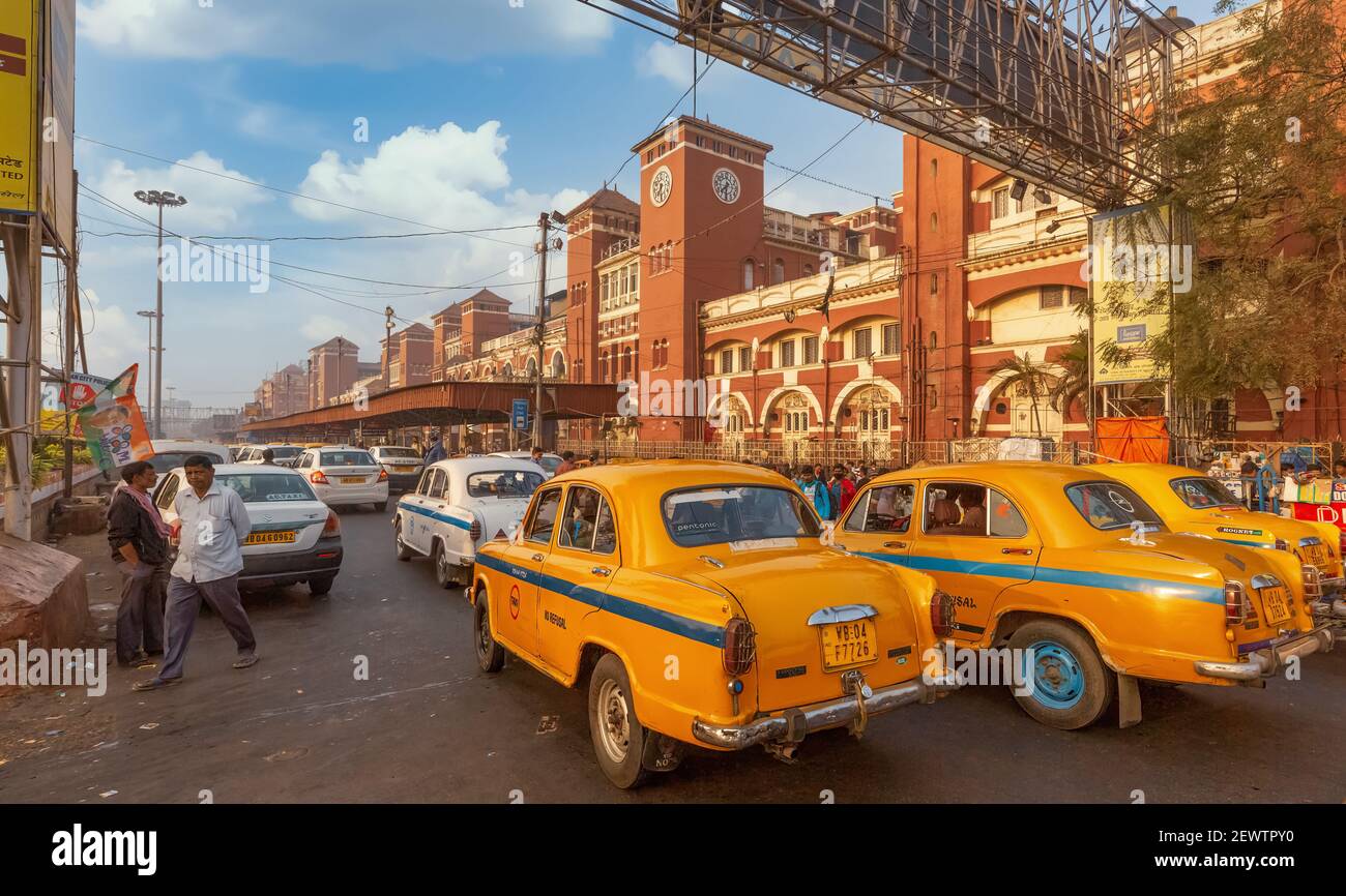 Yellow taxi in queue at Howrah railway station a popular city landmark ...