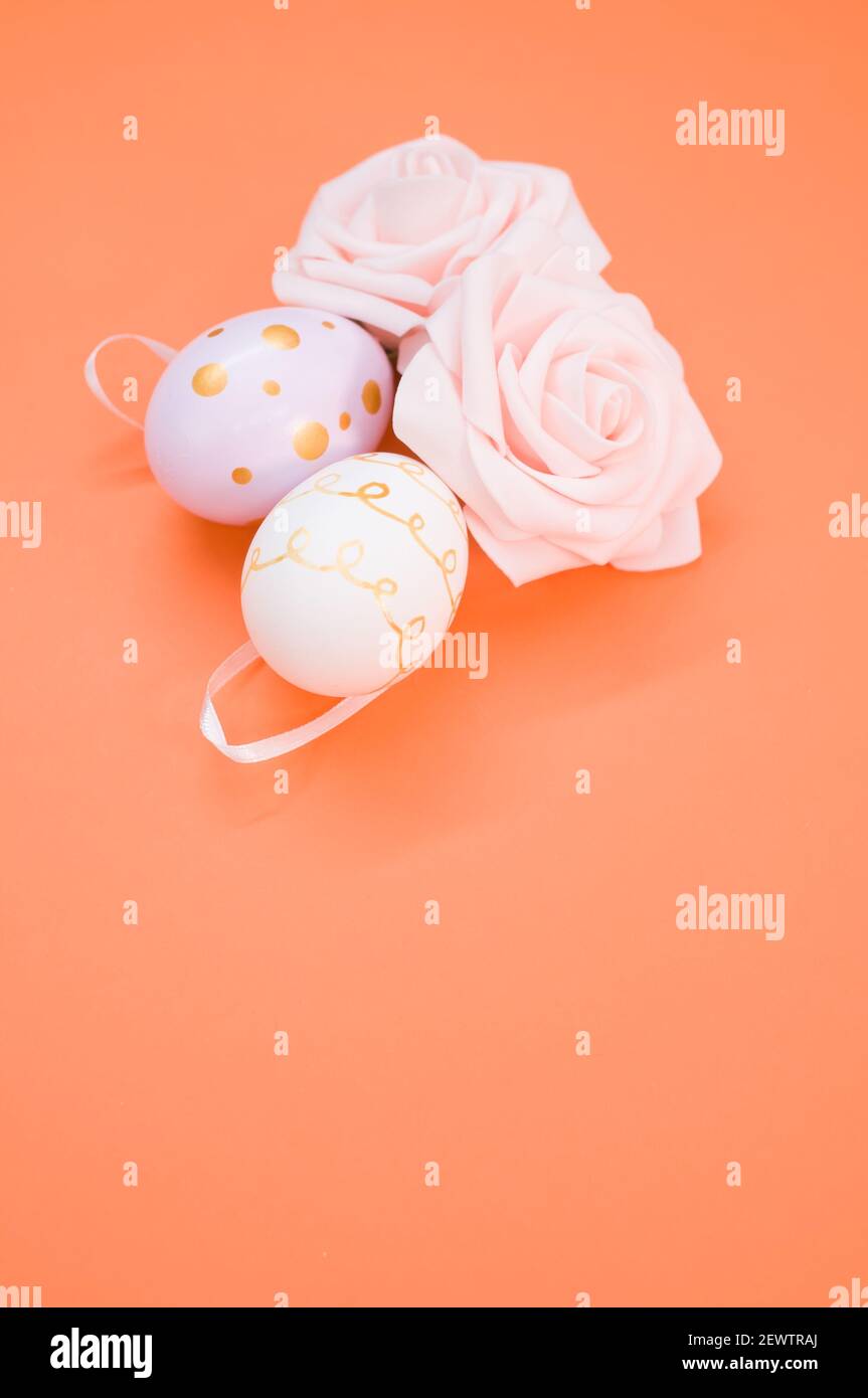 Beautiful composition with decorative ornamented Easter eggs and pink ...