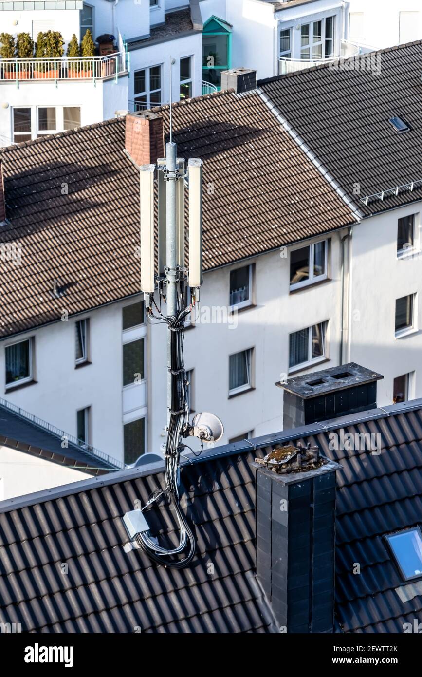 Antennas and transmitters on roof. Technology on the top of a building (5G, 4G) .Mobile phone ...