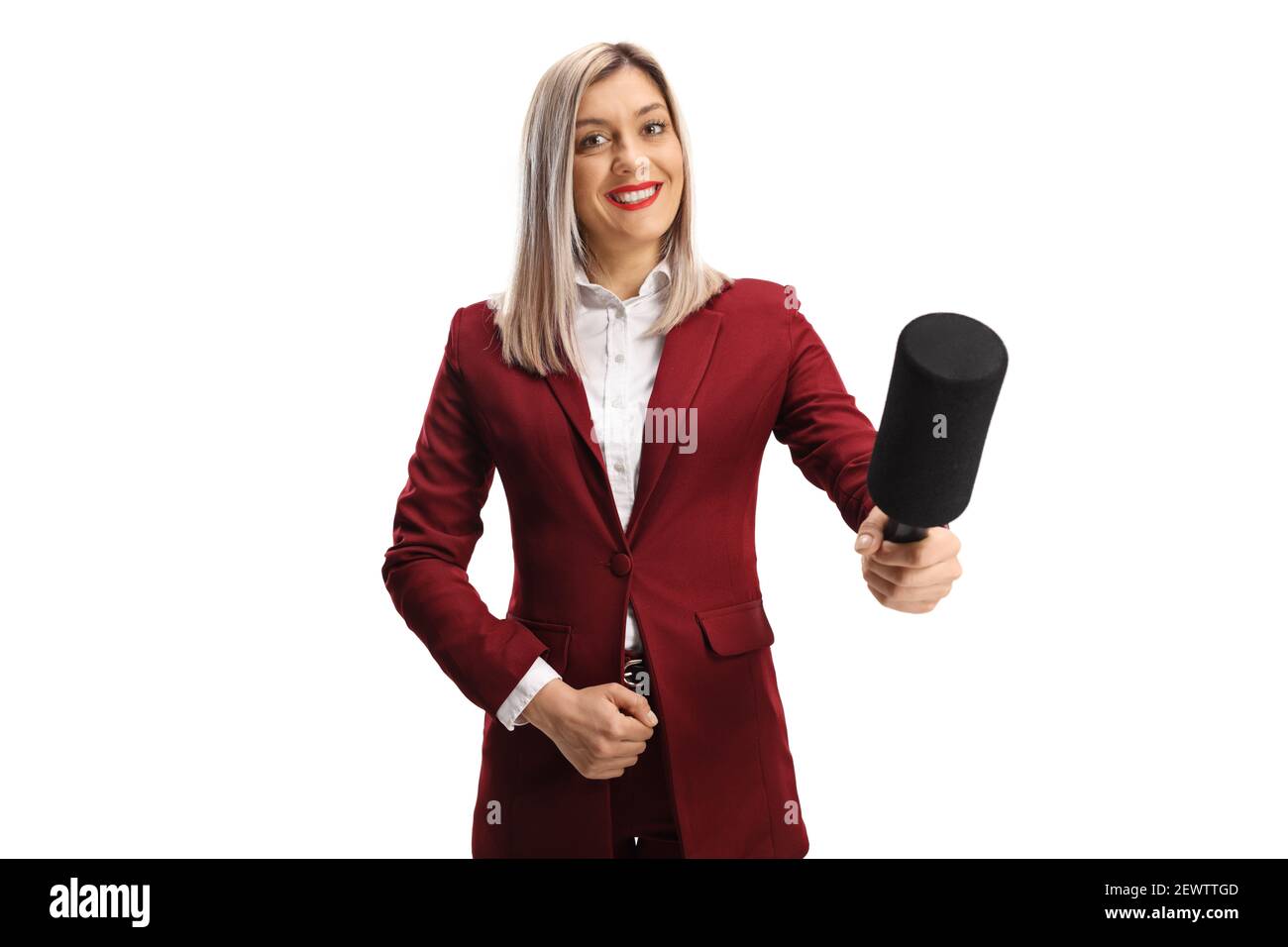 Female reporter with a microphone smiling isolated on white background ...