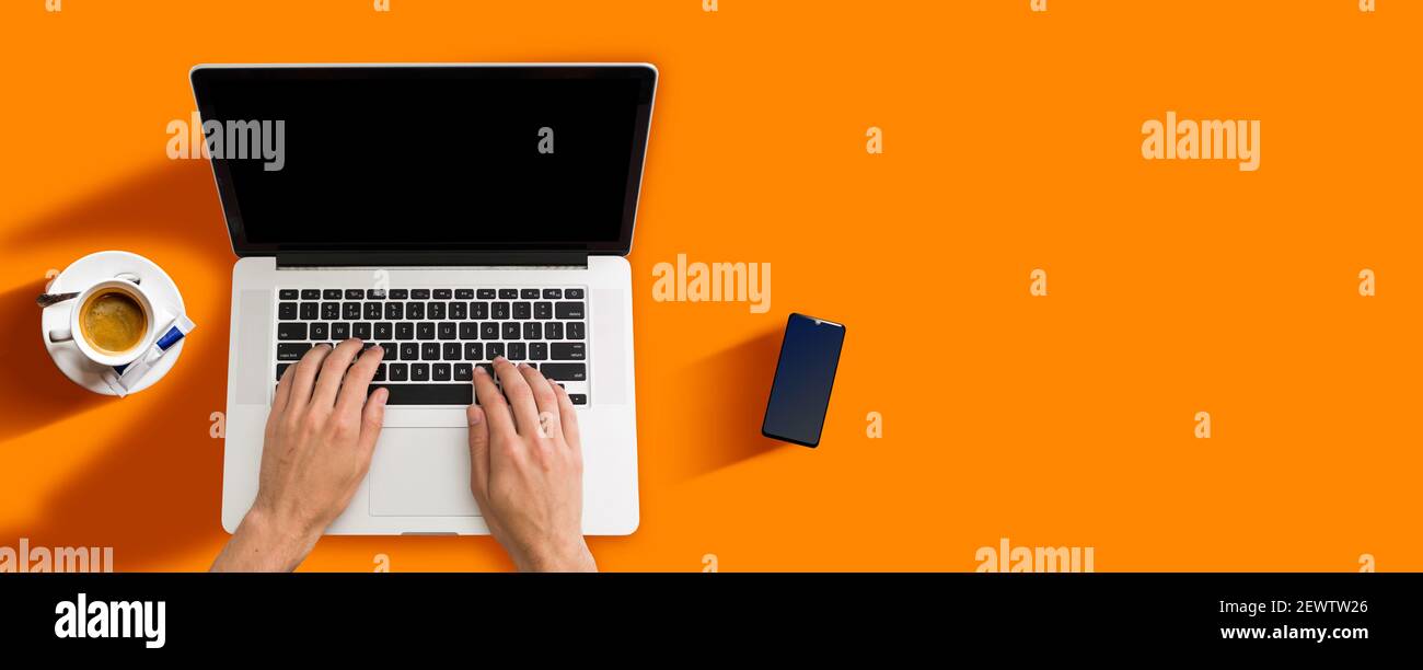 Man working with laptop, top view Stock Photo - Alamy