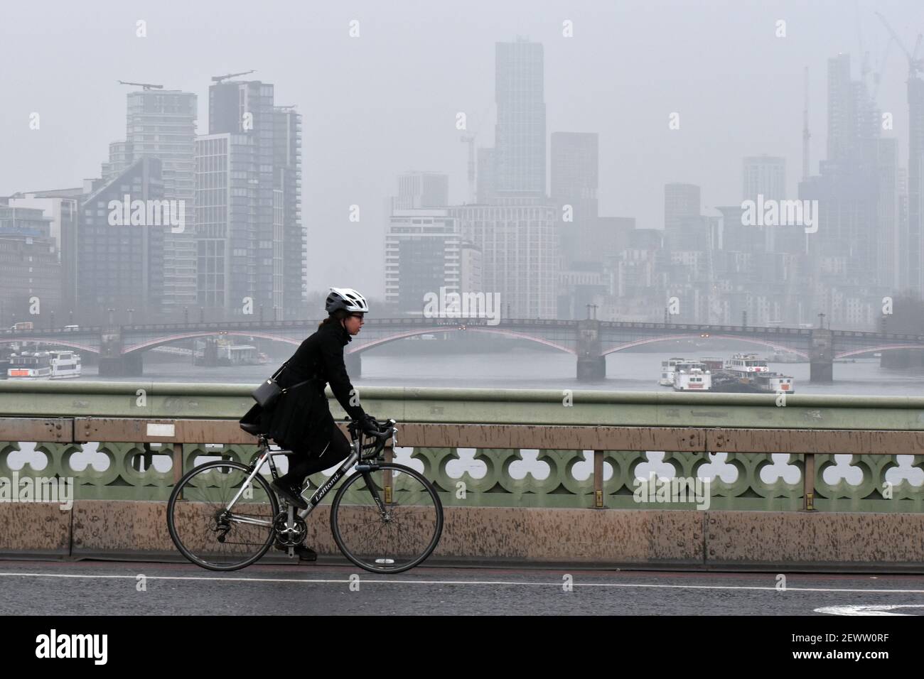 London, UK. 3rd Mar, 2021. Rain on Westminster Bridge in Central London ...