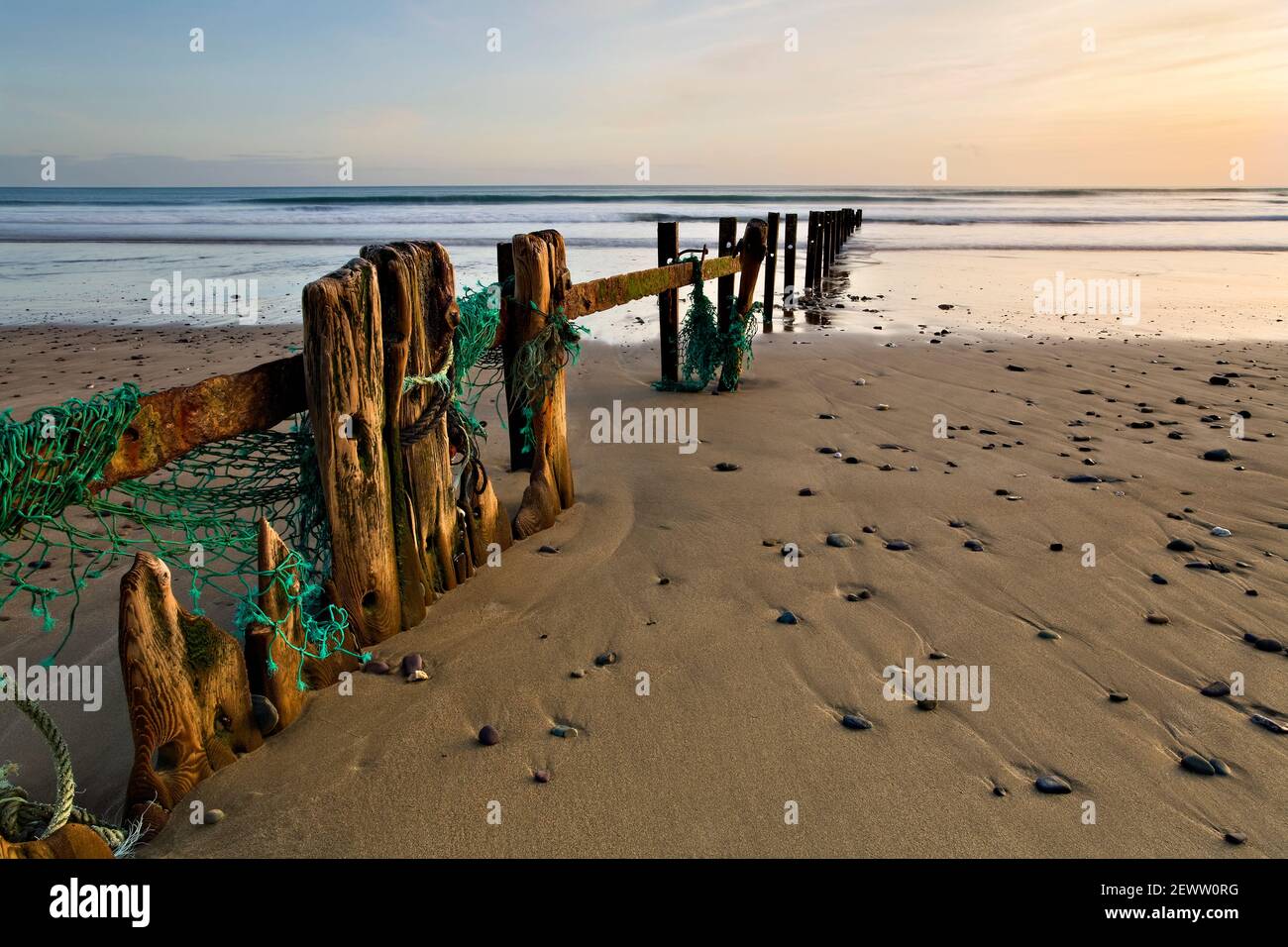 The old breakwaters at Garrettstown beach in County Cork, Ireland ...