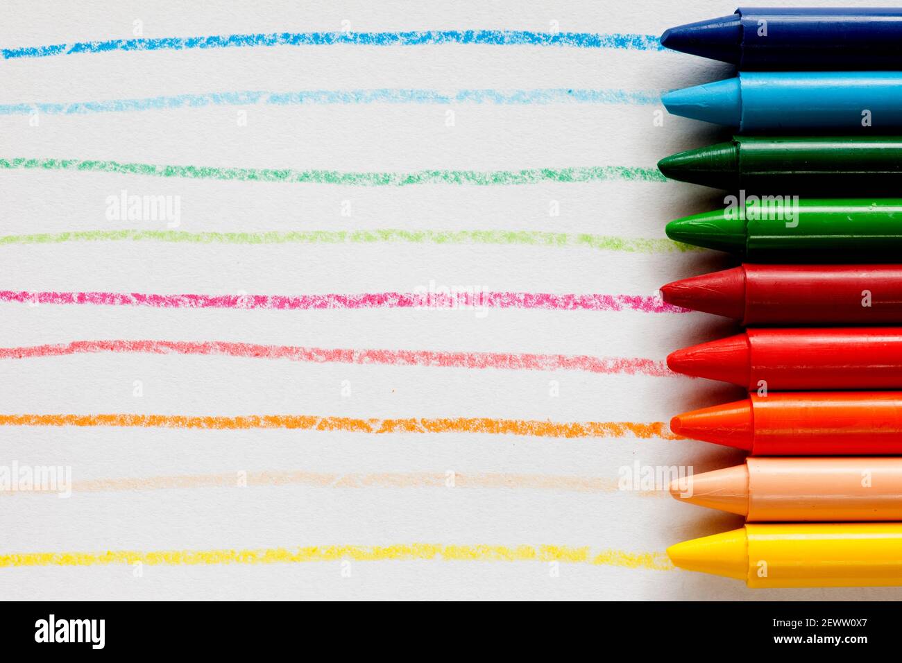 Colorful crayons and lines over white background Stock Photo - Alamy