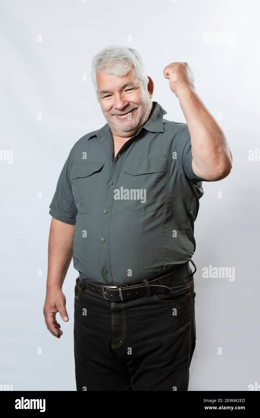 Happy Hispanic Elderly Man Celebrating - Mature Man Smiling on White ...