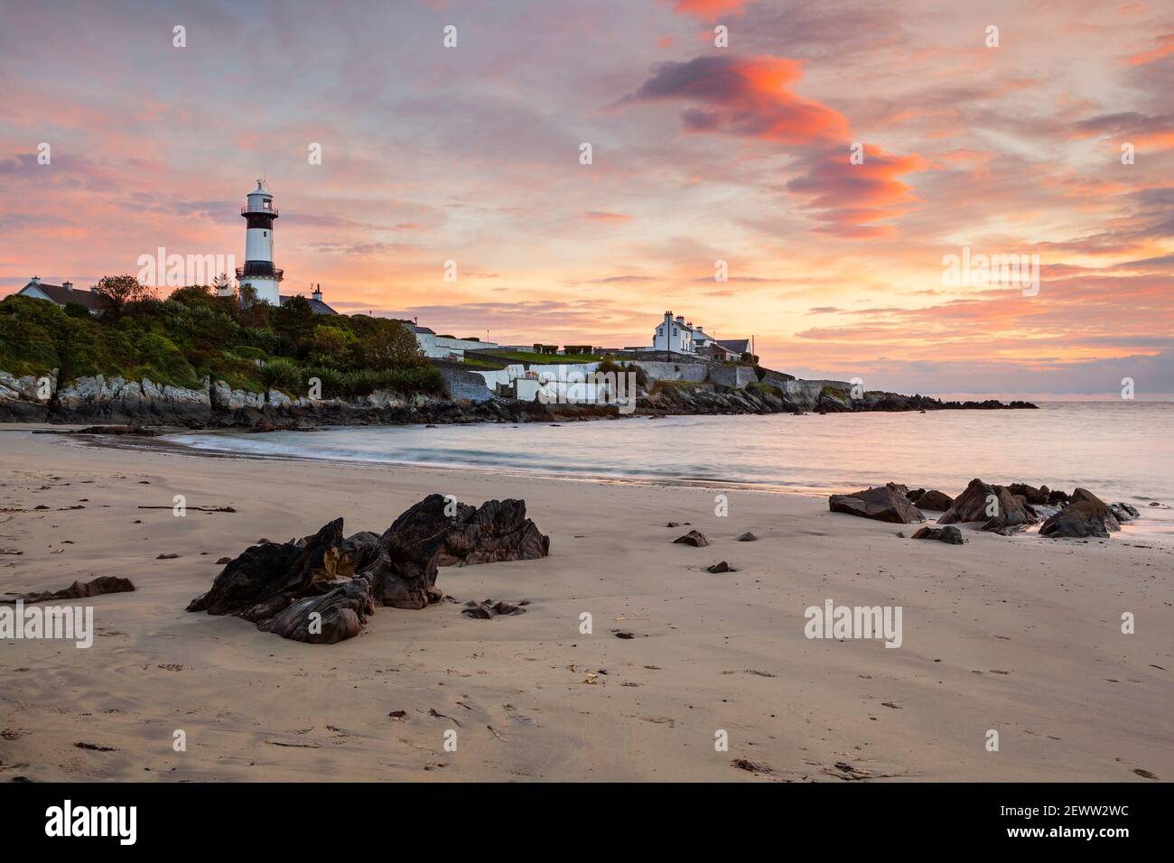 Dawn at Strove lighthouse, at Dungaree point in County Donegal, Ireland ...