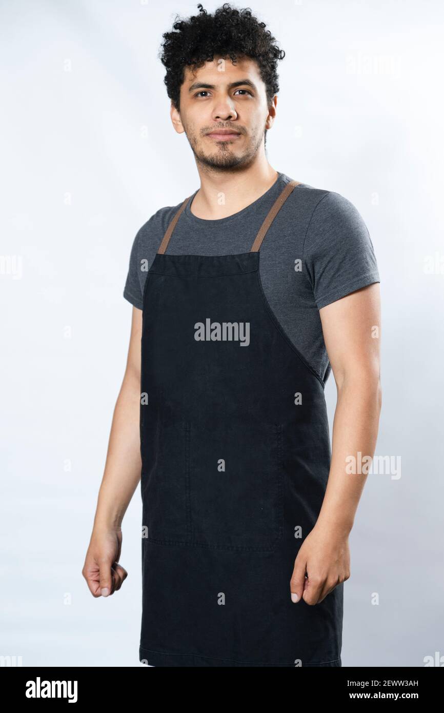 Black Apron Mockup - Hispanic Young Man Wearing Apron Smiling on White ...