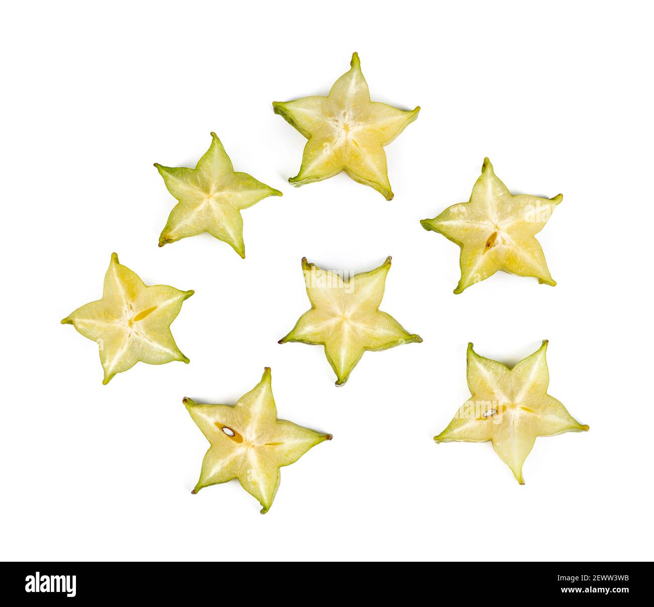 A group of starfruit slices isolated over white background Stock Photo ...