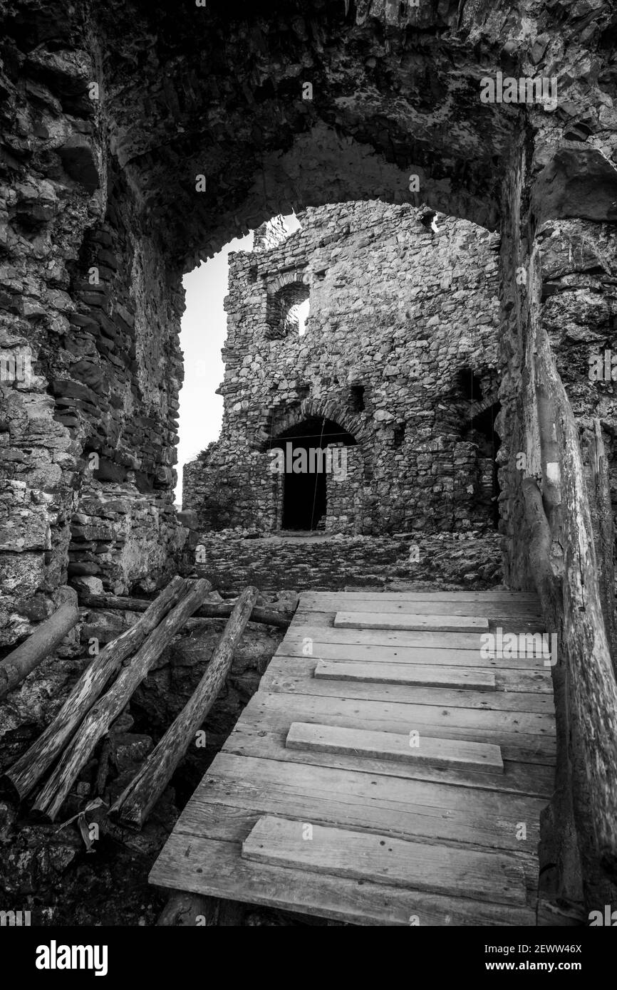 Entrance to the medieval castle ruins Black and White Stock Photos ...