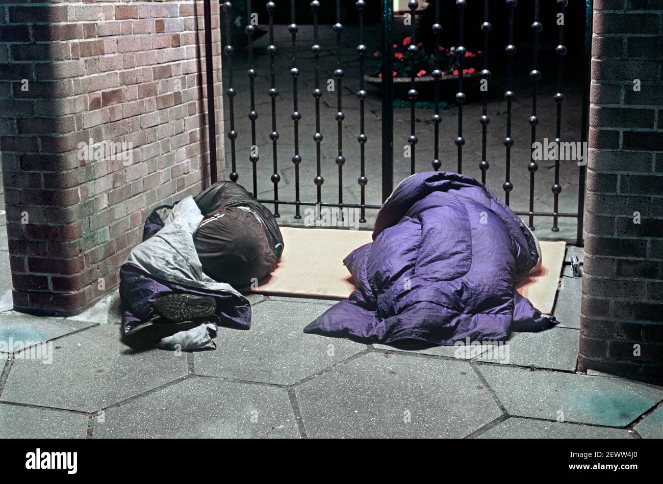 Homeless people sleeping in doorway hi-res stock photography and images ...