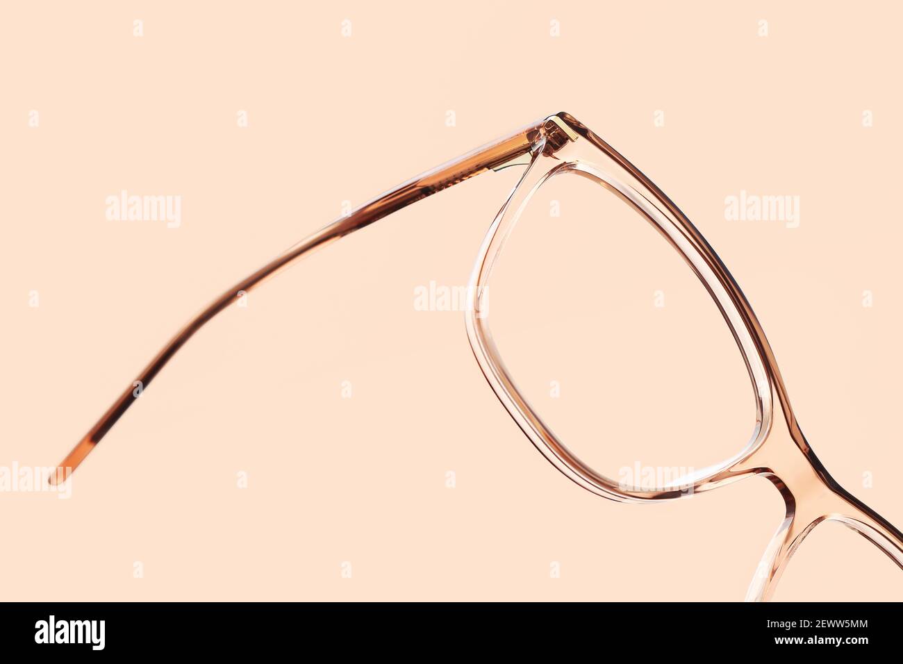 eyewear spectacles close up isolated on beige background Stock Photo ...