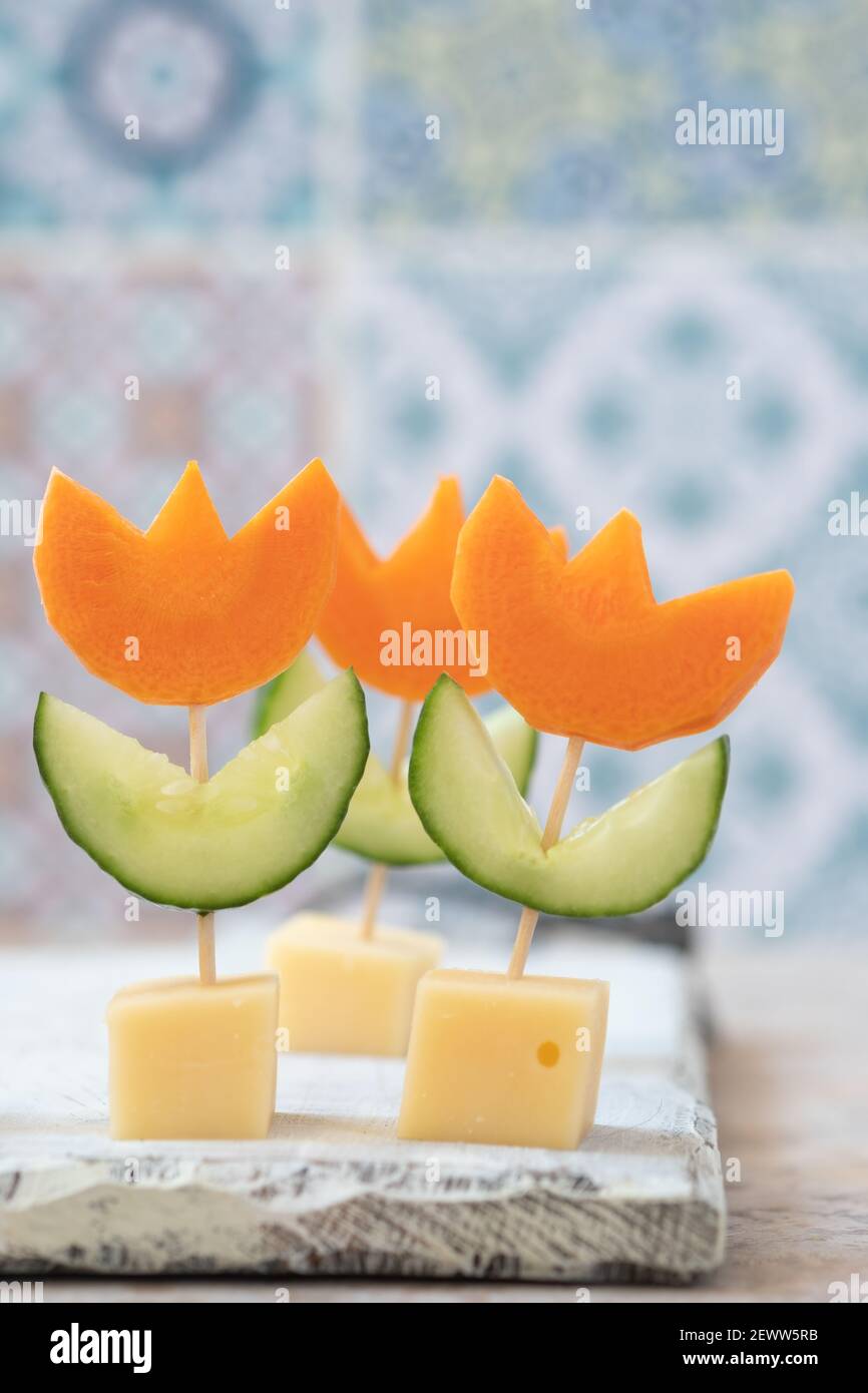 Canape flower with cucumber, carrot and cheese Stock Photo - Alamy