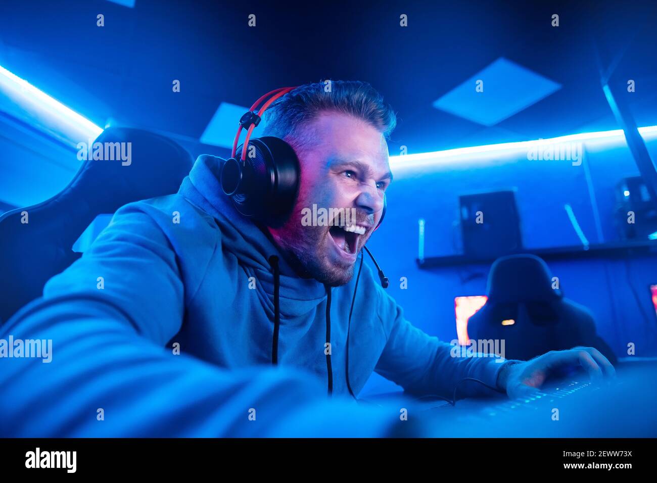 Streamer young man angry screams defeat professional gamer playing ...