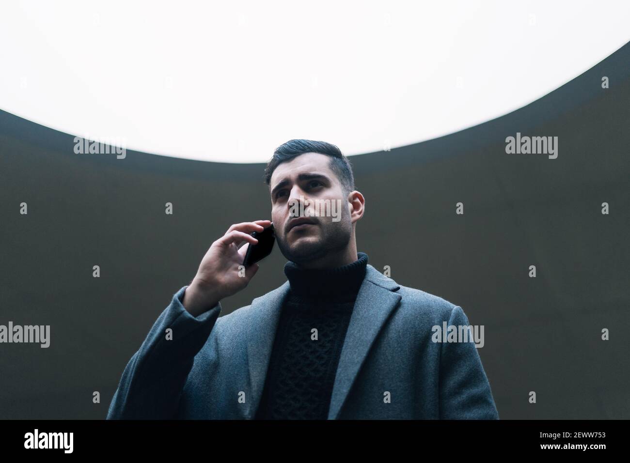 Young businessman making call hi-res stock photography and images - Alamy