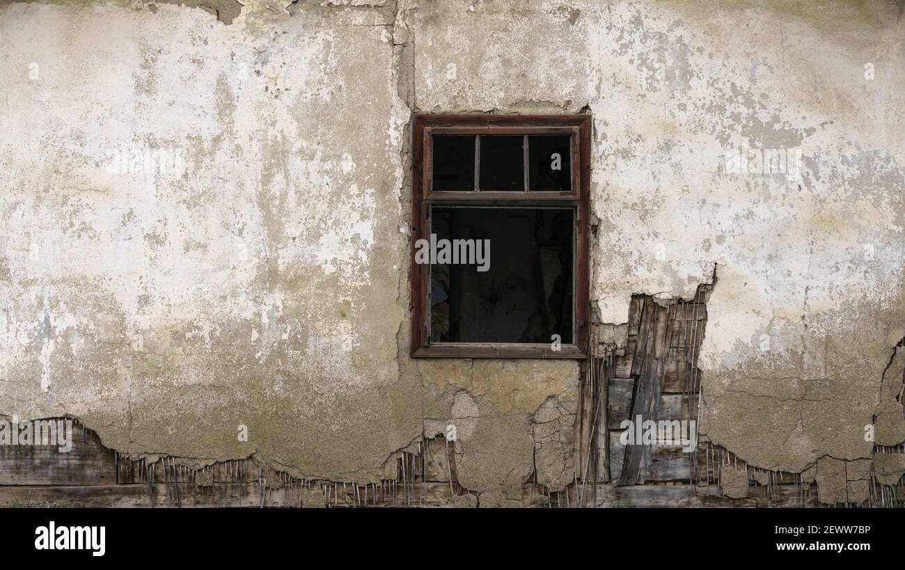 Grunge old wall and broken wooden window of abandoned building texture ...