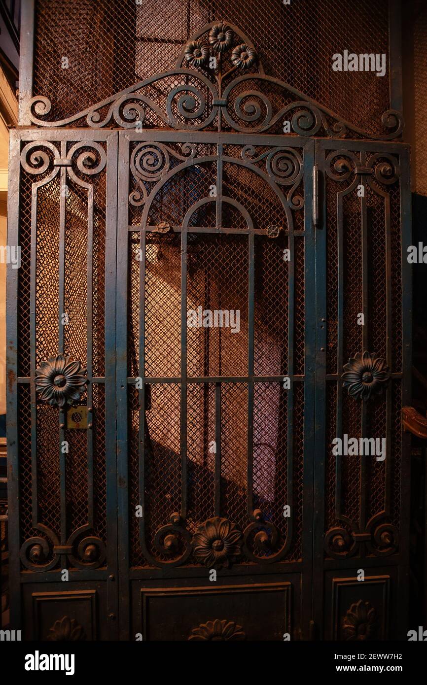 Old vintage rusty elevator gates in old mansion Stock Photo - Alamy