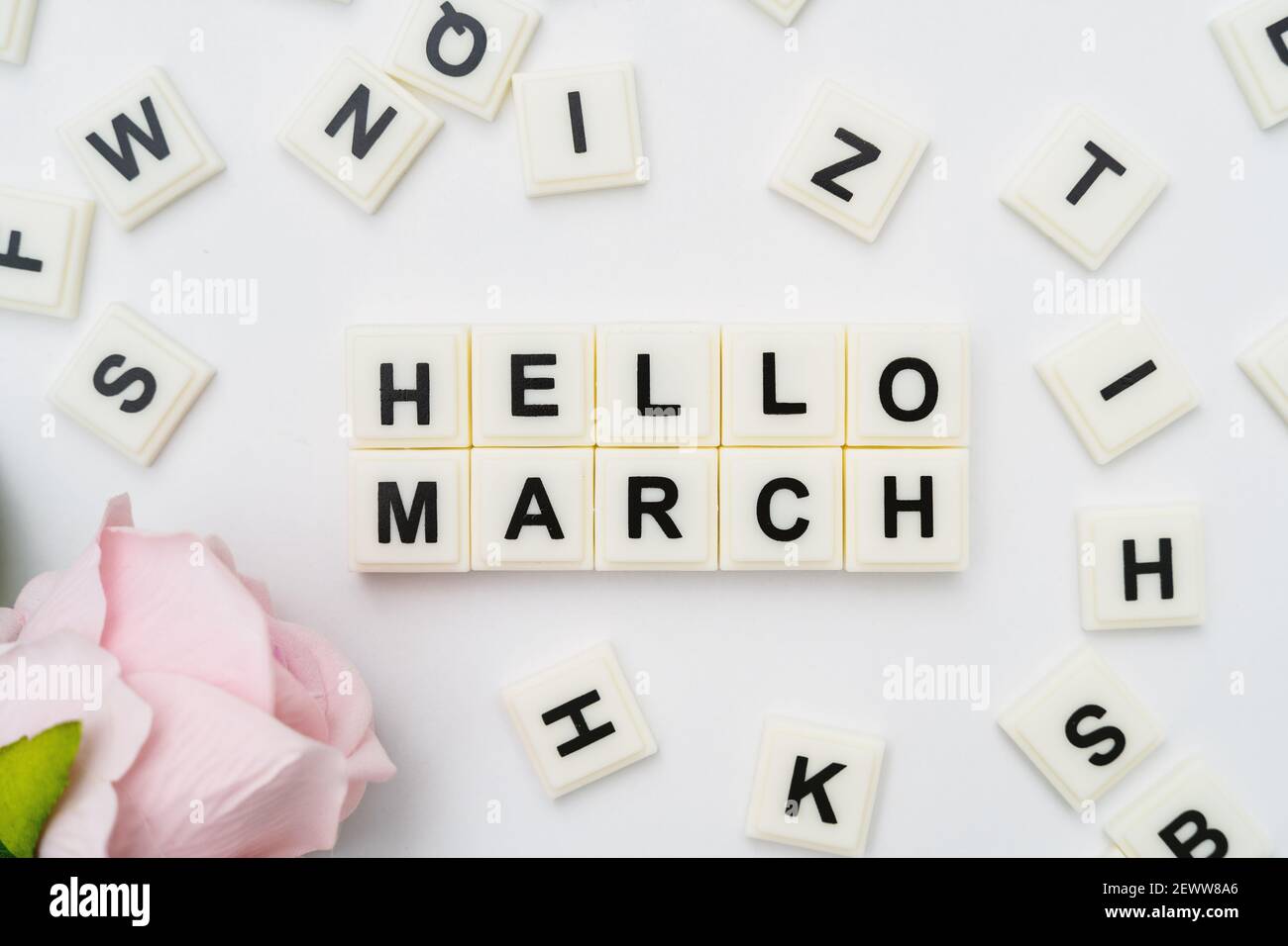 Hello March. Alphabet Blocks and Flower on White Background Stock Photo ...