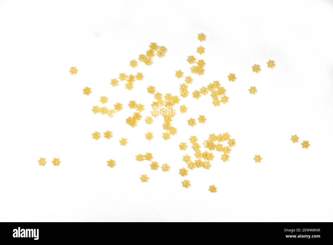 Pasta star shape isolated on white background. A portion of stars ...