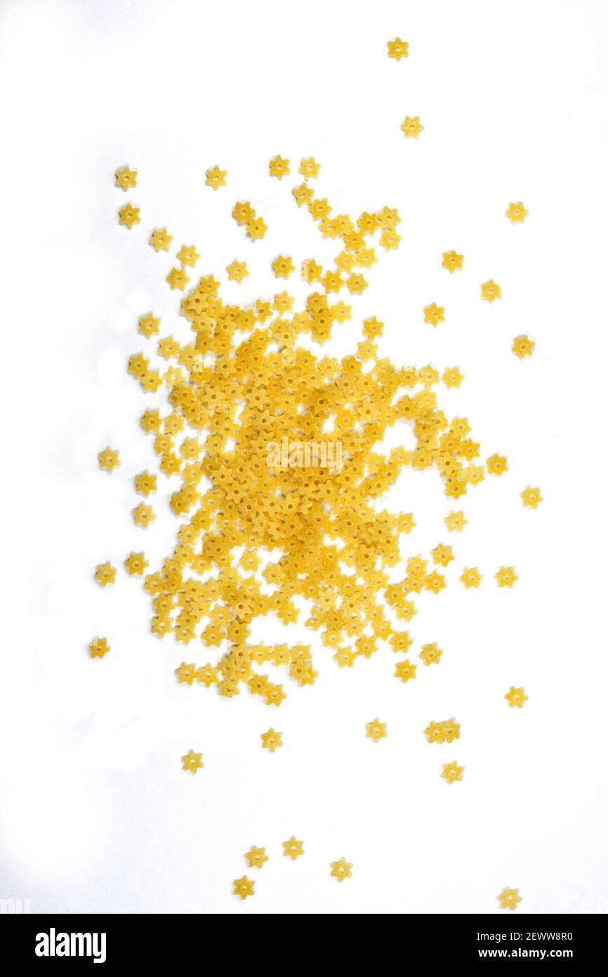 Pasta star shape isolated on white background. A portion of stars ...