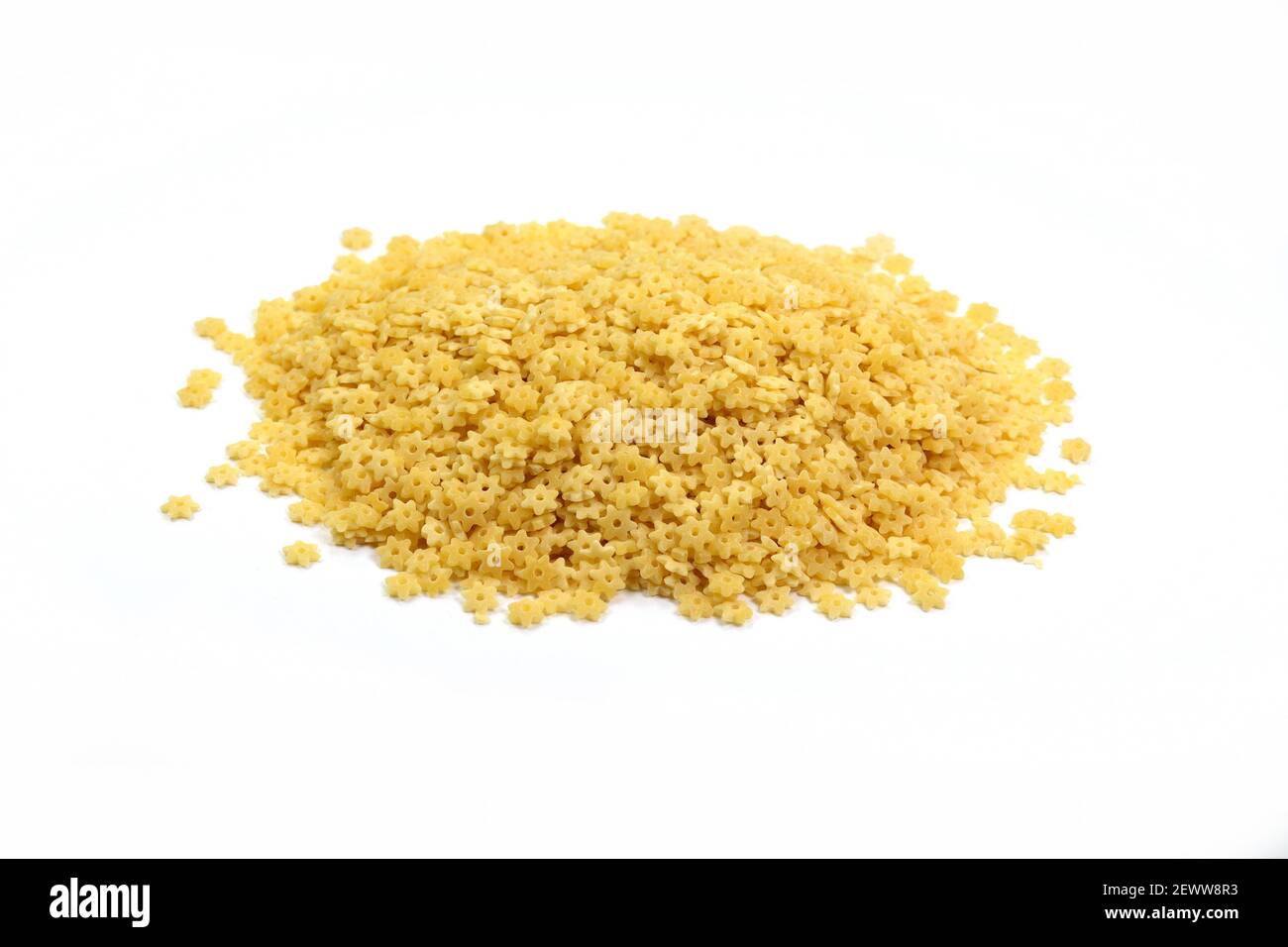 Pasta star shape isolated on white background. A portion of stars ...
