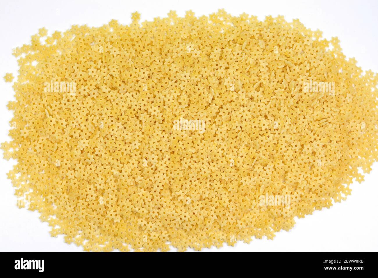 Pasta star shape isolated on white background. A portion of stars ...