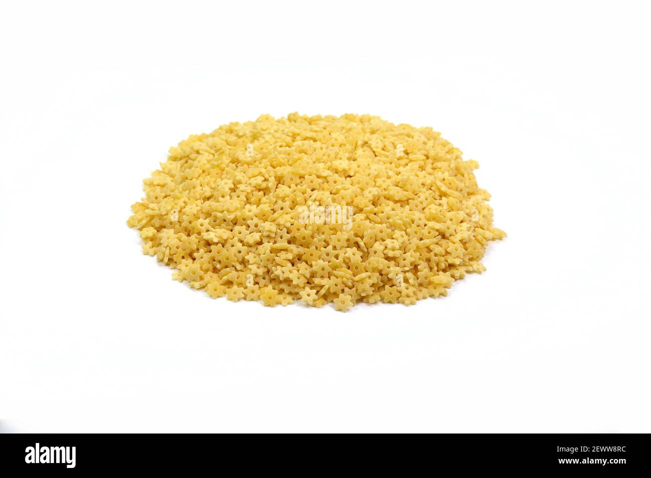 Pasta star shape isolated on white background. A portion of stars ...